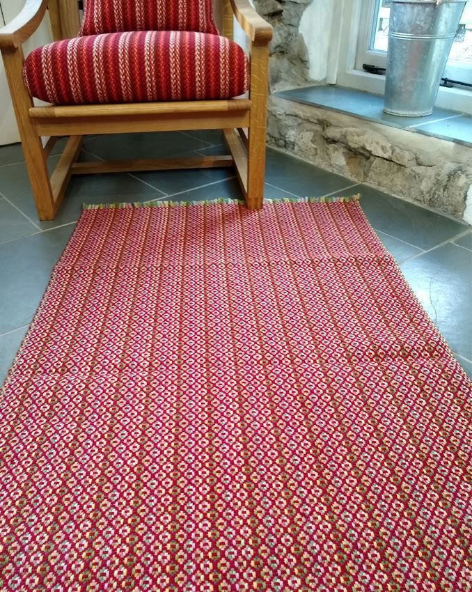 Berry Red Hiraeth Floor Rug. Solva Woollen Mill
